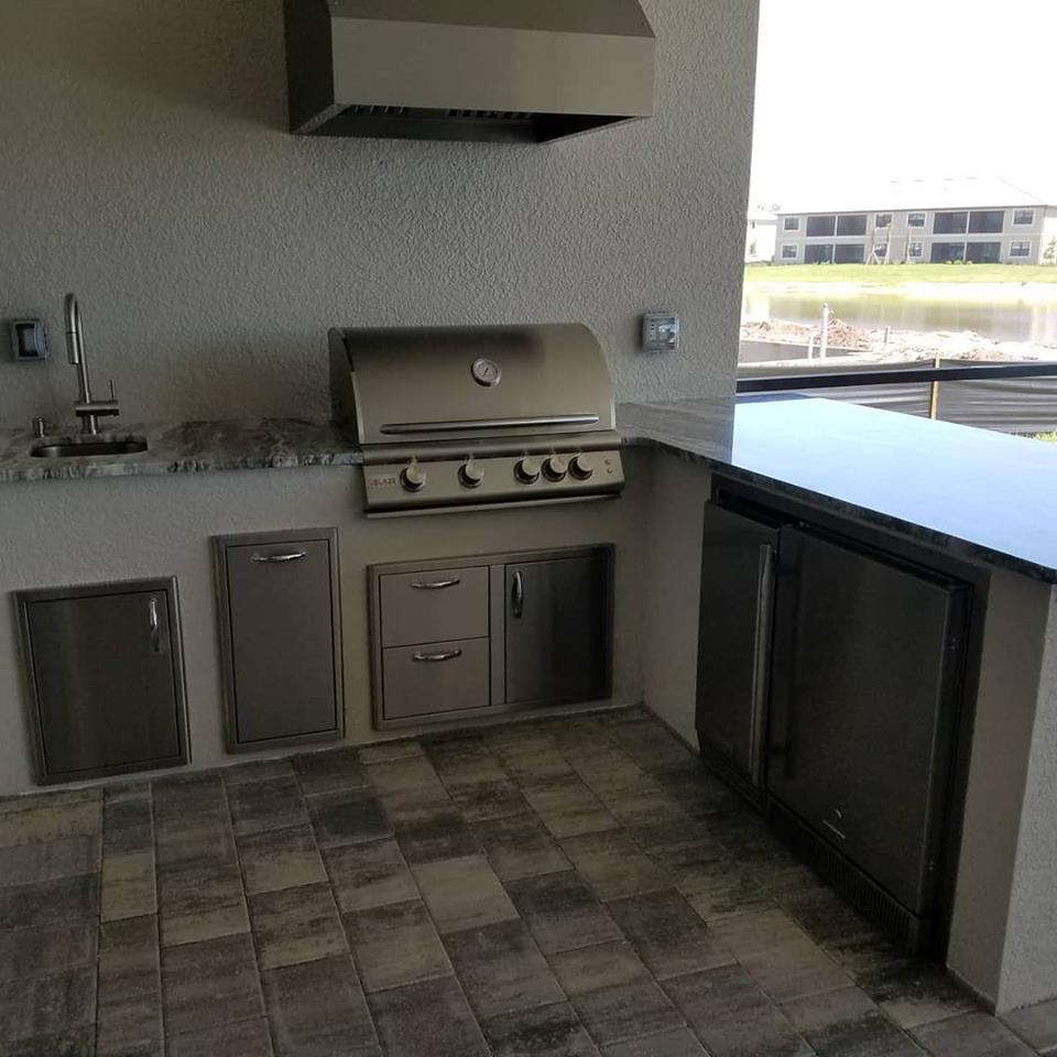 A Clean Coastal Looking Barbecue Island Design - Elegant Outdoor Kitchens