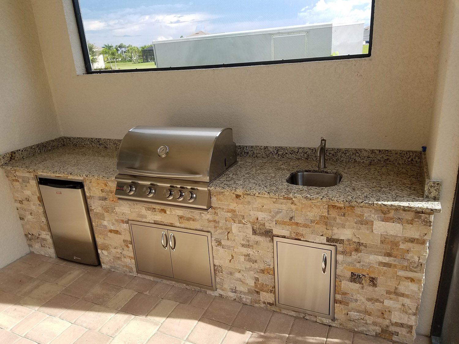 Custom Cappadocia Stacked Stone Kitchen by EOK - Elegant Outdoor Kitchens