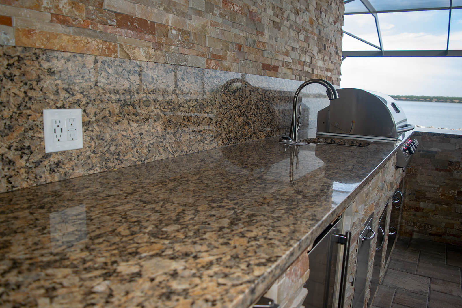 Stacked Stone and Granite Paradise Kitchen - Elegant Outdoor Kitchens
