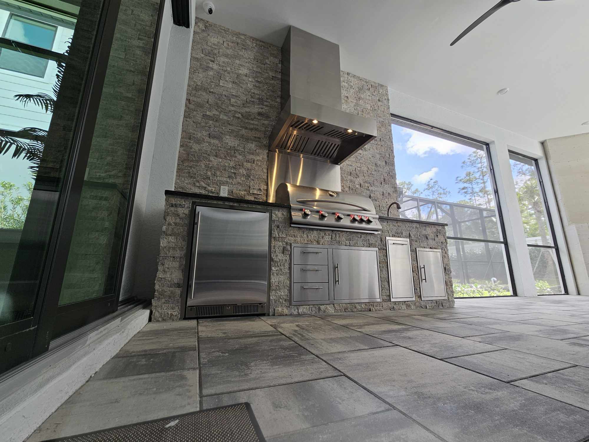 Pure Radiance - Silver Travertine & Uba Tuba Granite - Elegant Outdoor ...